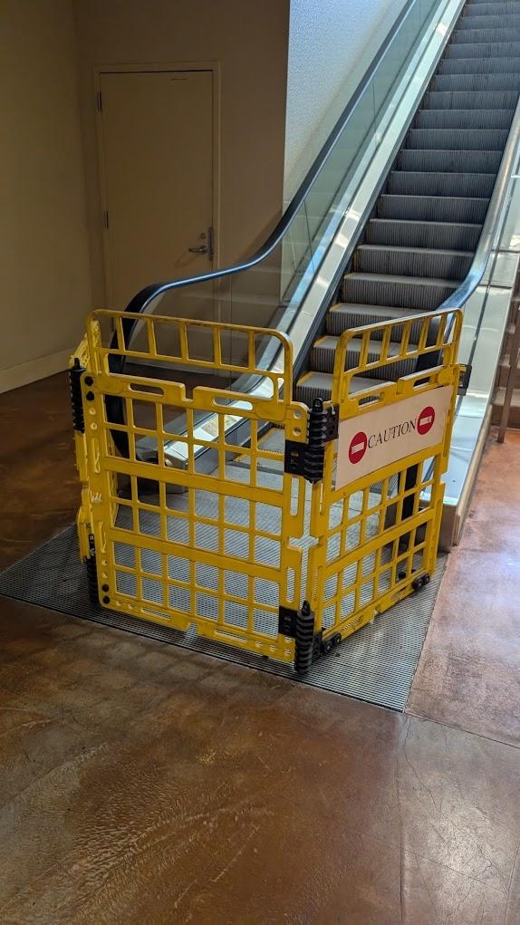 Escalator and People Mover have been broken for at least 2 years