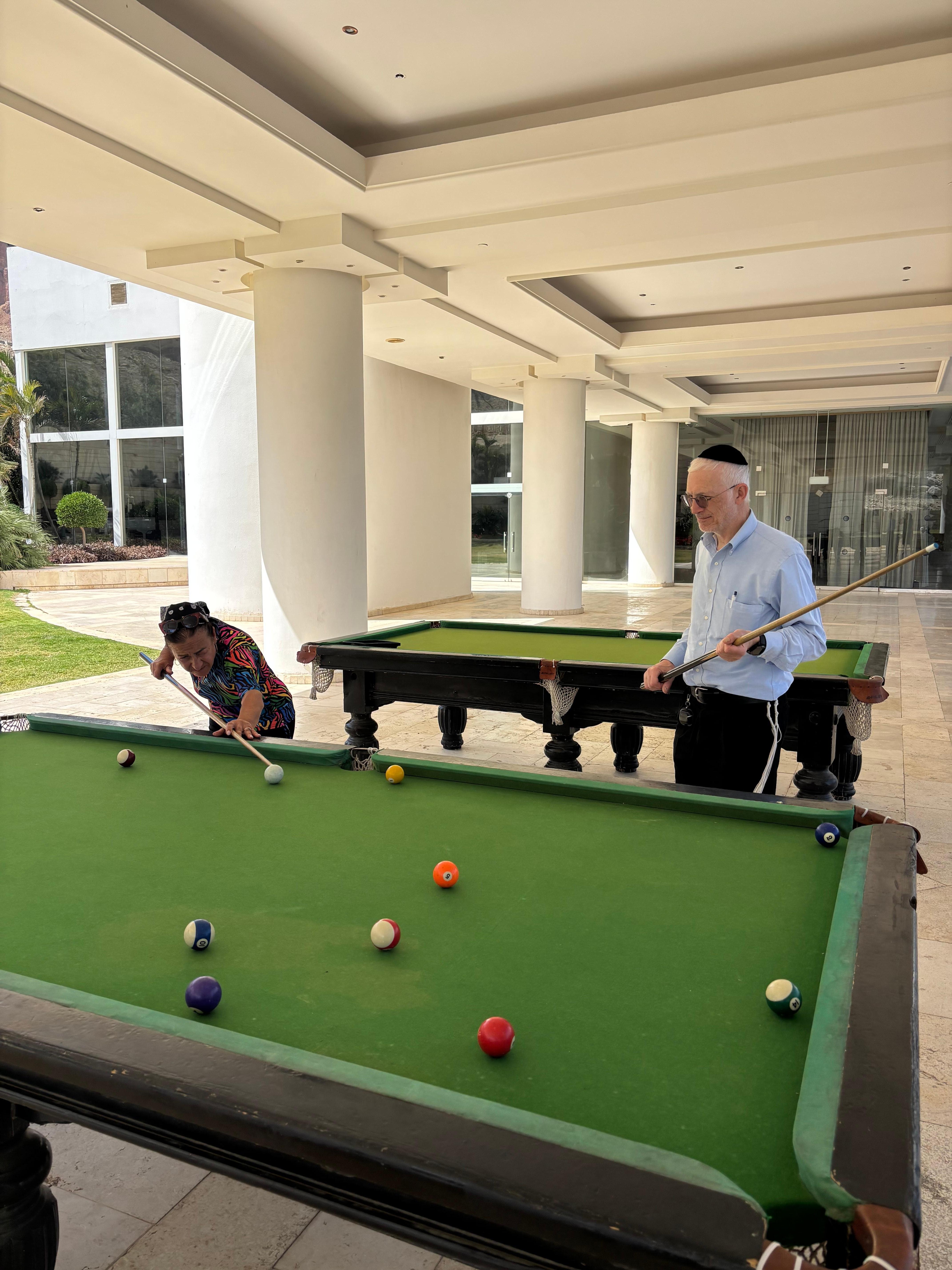2 pool tables and a table tennis table