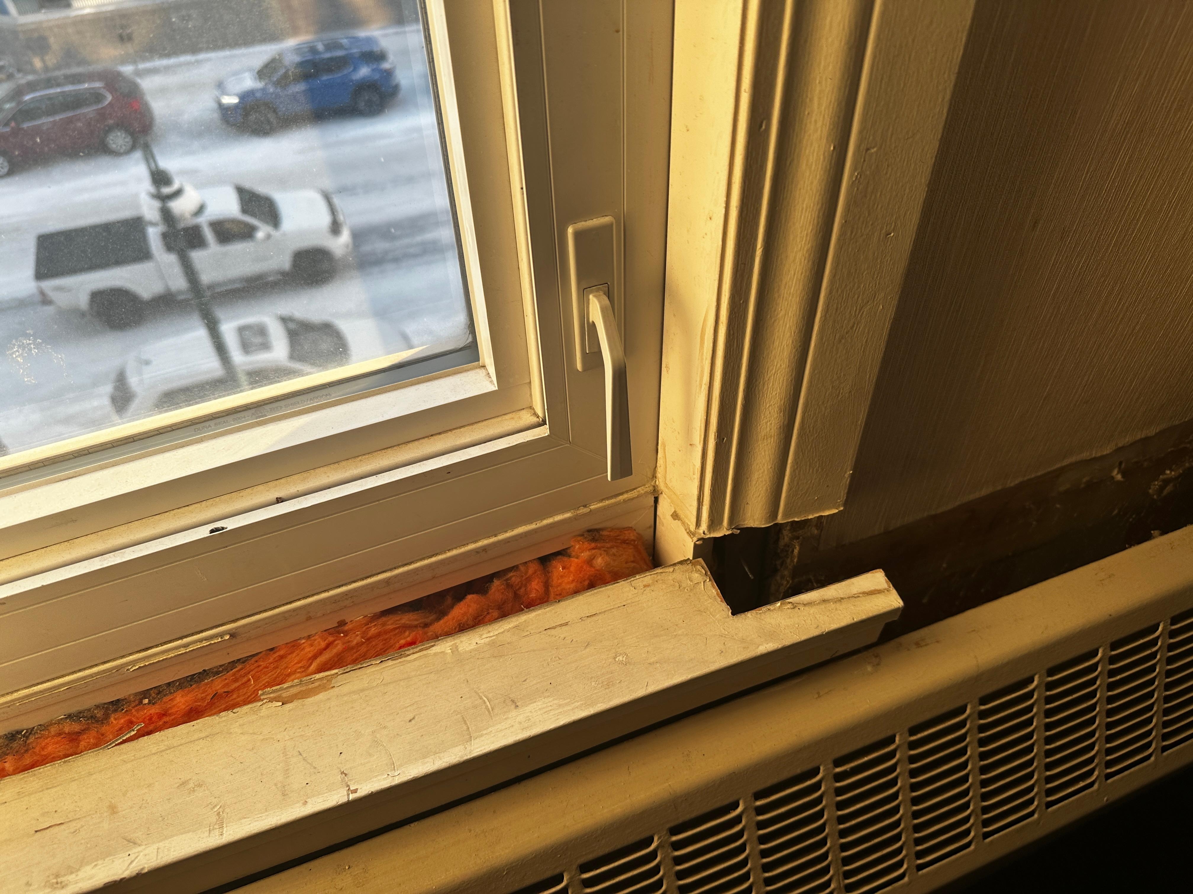 The window sill and rad cover.