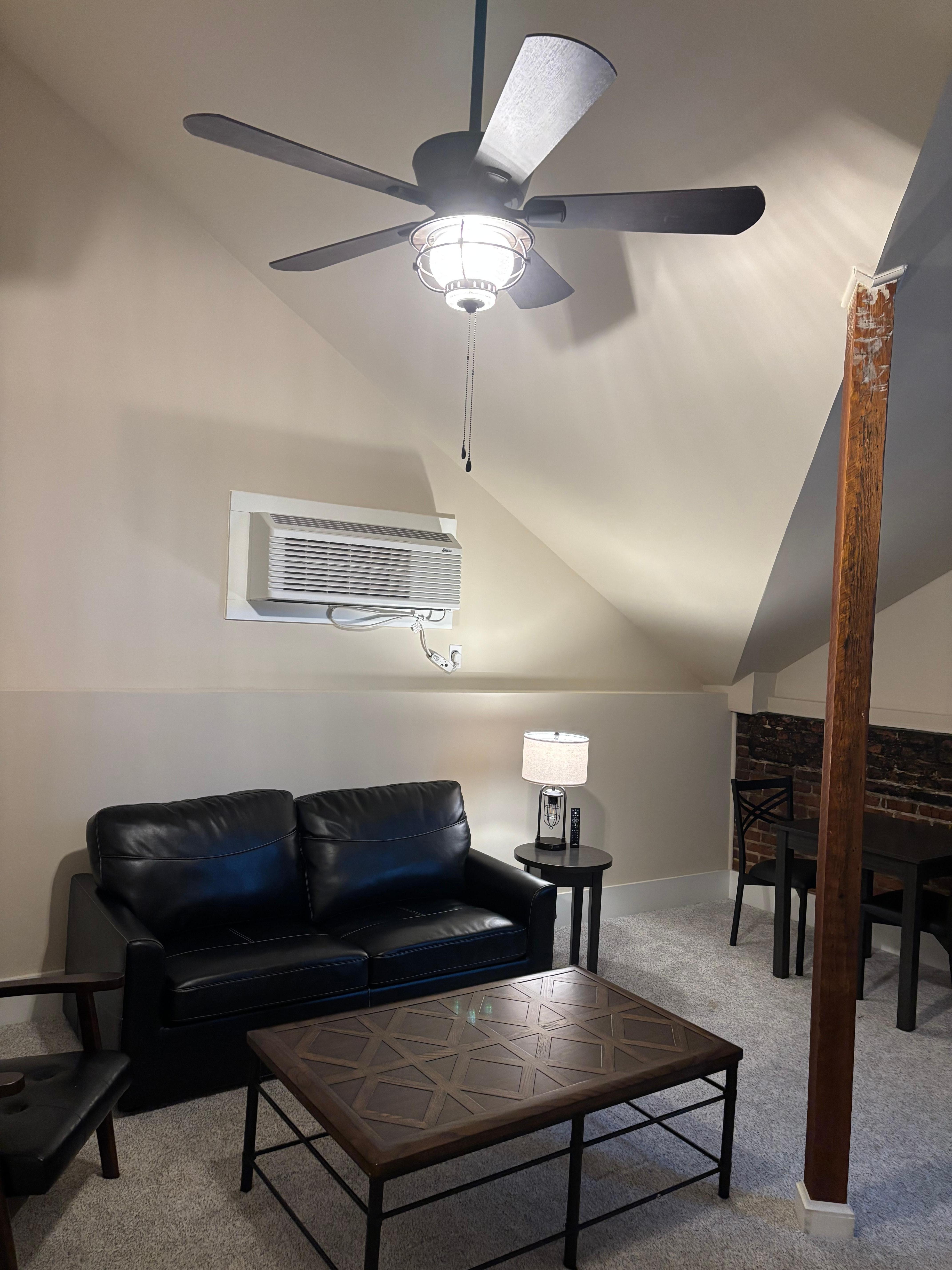 5th floor suite entry door opens into sitting area.