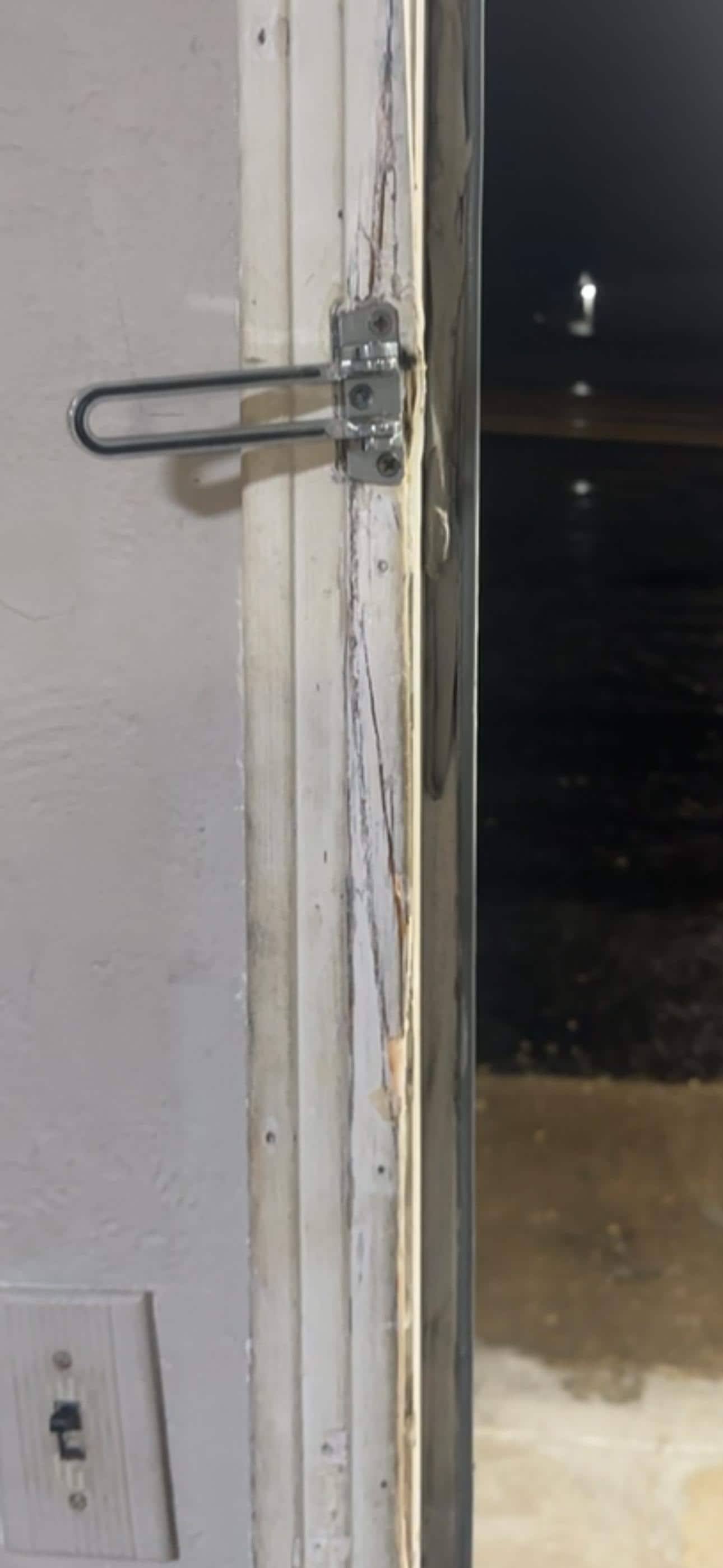  Broken door jam and busted light switch 