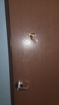 bathroom door (existing damage)