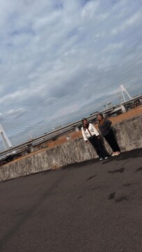 Happy riders on trail behind hotel