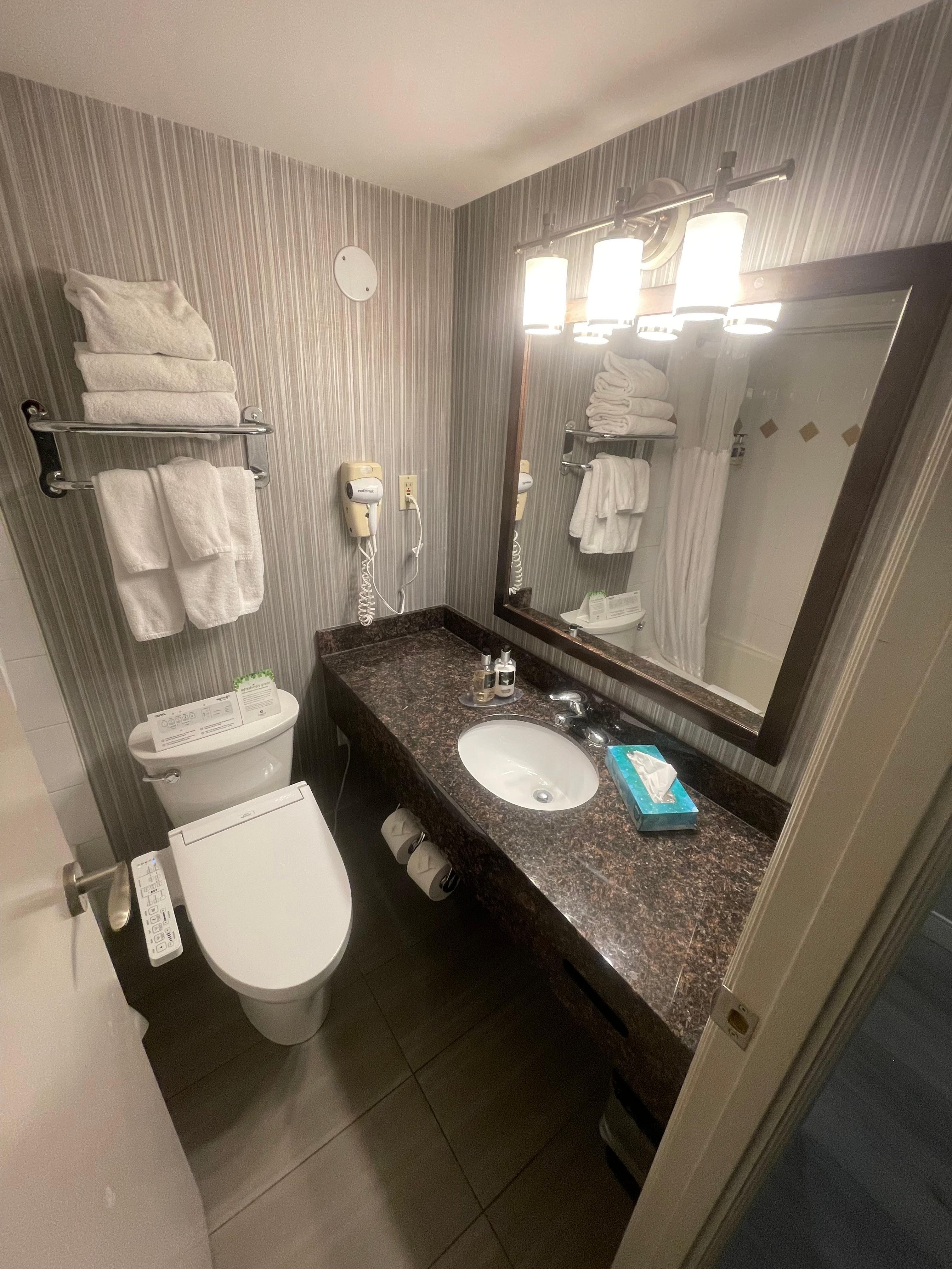 Bathroom ( Comes with a tub and integrated shower ) 