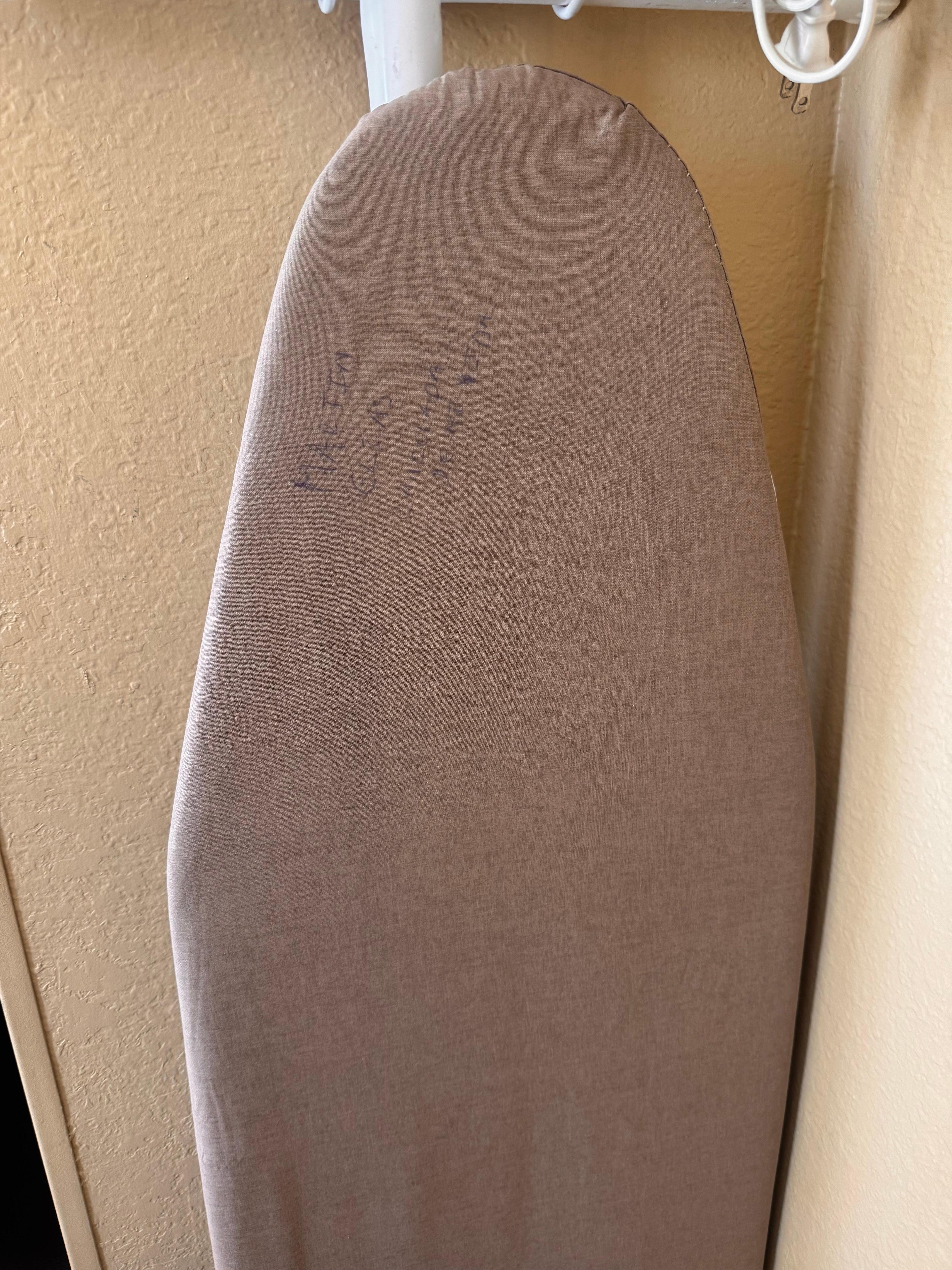 Poor condition of the room. Writing on iron board!