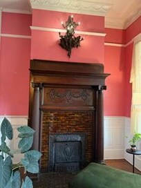 Fireplace upon entrance in Lobby