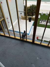 Visiting with friends on Room 432 balcony