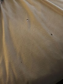 Cigarette burns in our blankets