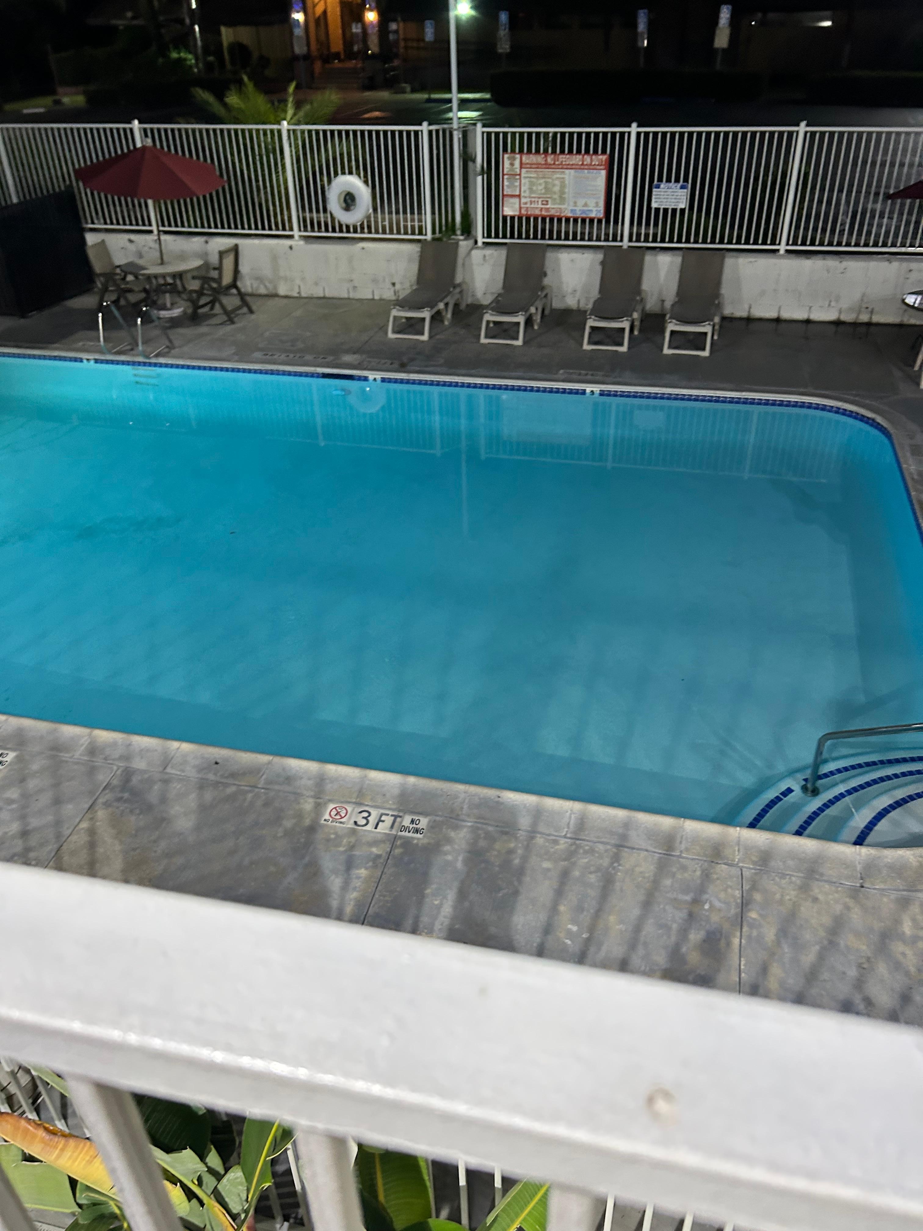 Night photo of pool. 