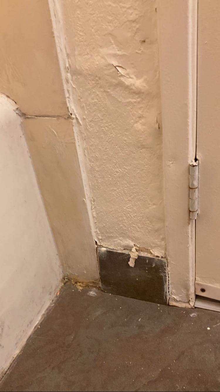 Bathroom wall next to tub