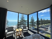 Beautiful room with impressive views marred only by unyielding linen and an aggressive AC unit.