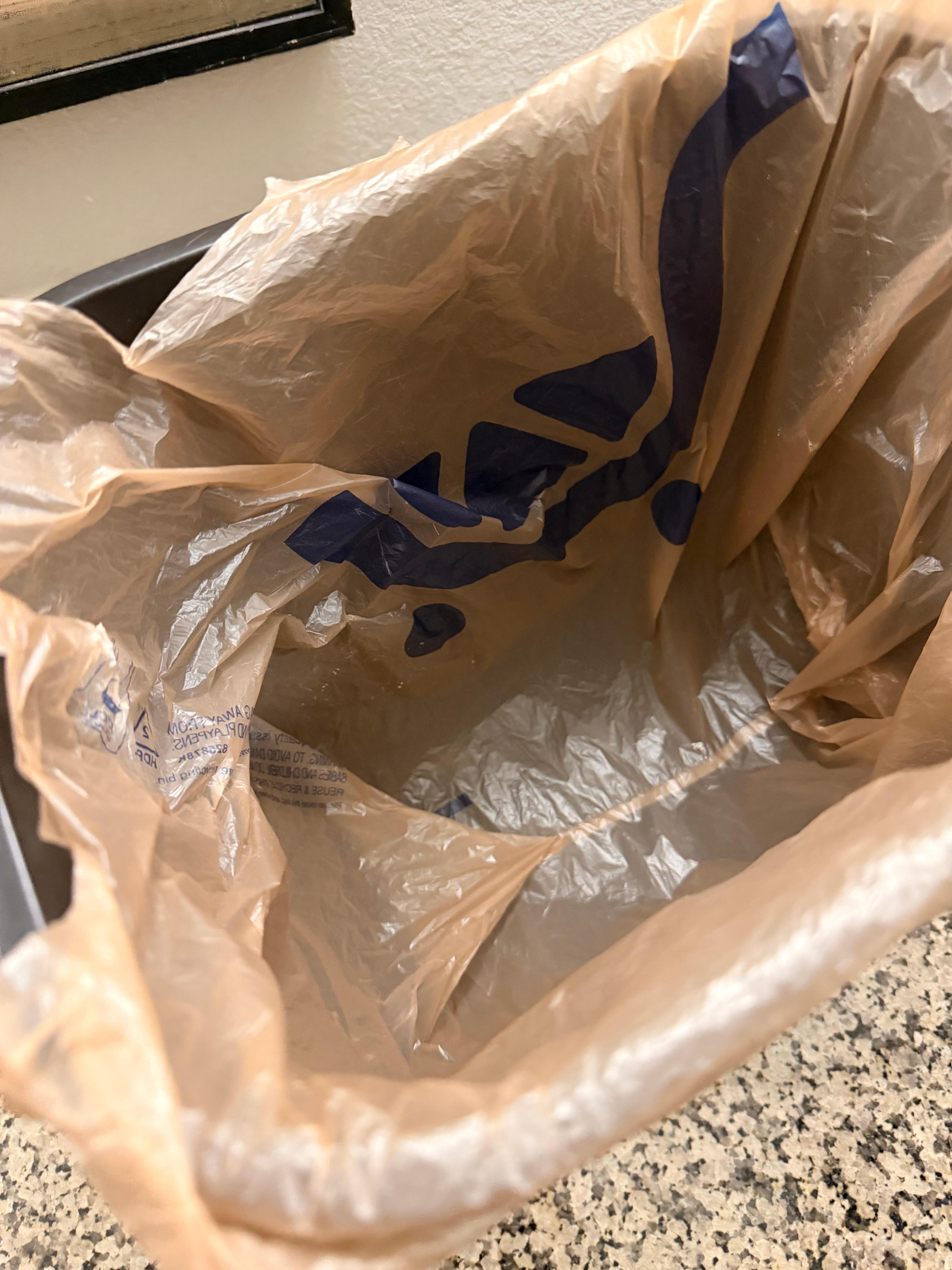 They reused grocery store bags as trash bags, tells you how this property really is. 