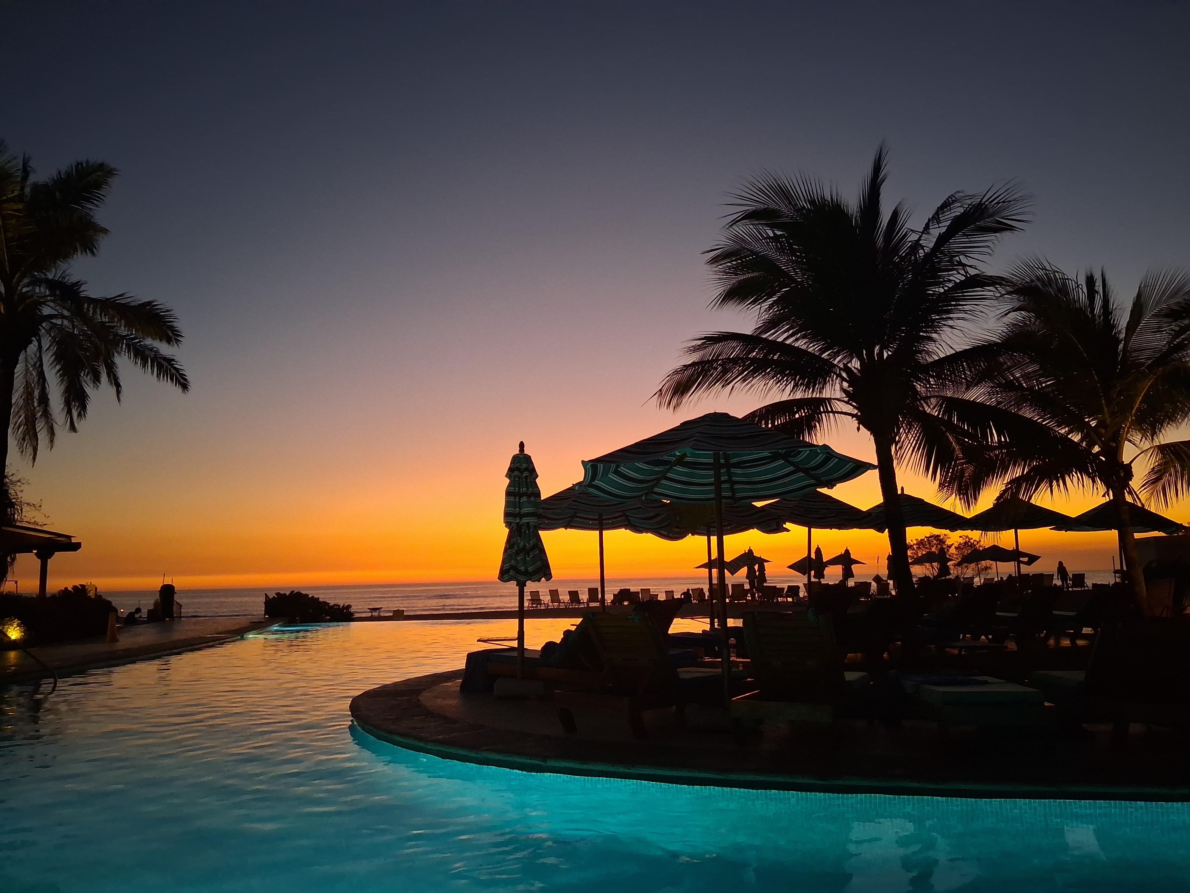 View from the pool overlooking the ocean just after sunset 