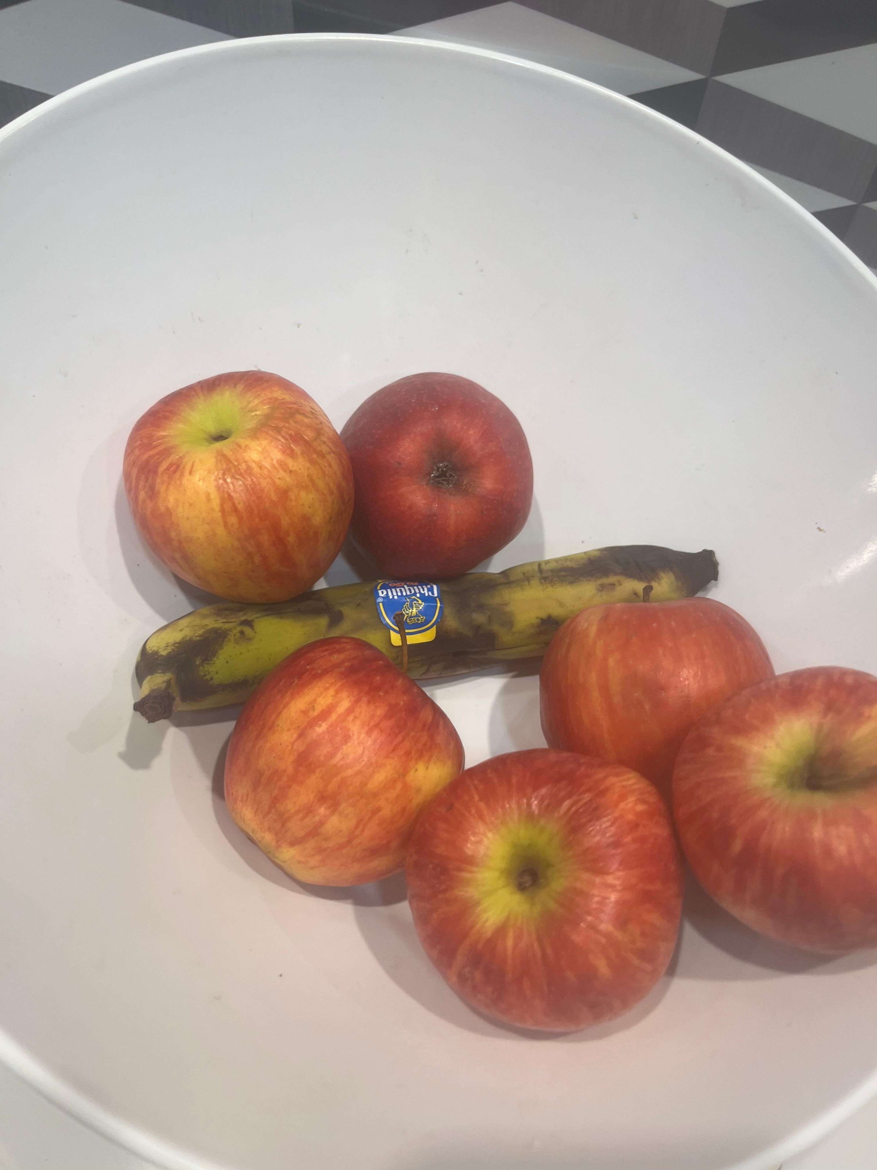 I grabbed an apple and it was so soft and wrinkly. Two bowls put out with old fruit 
