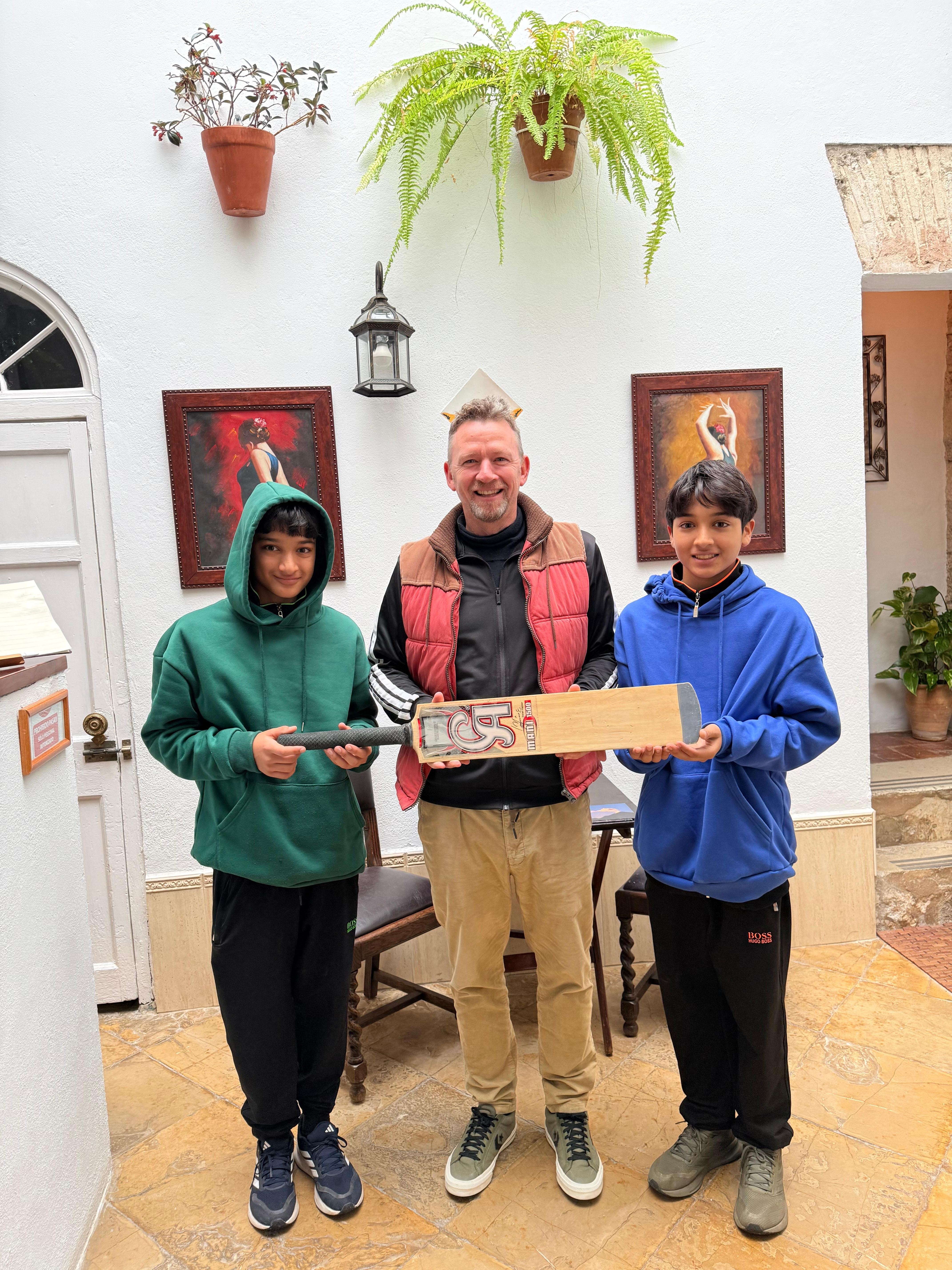 My boys having a chat about cricket with the host 