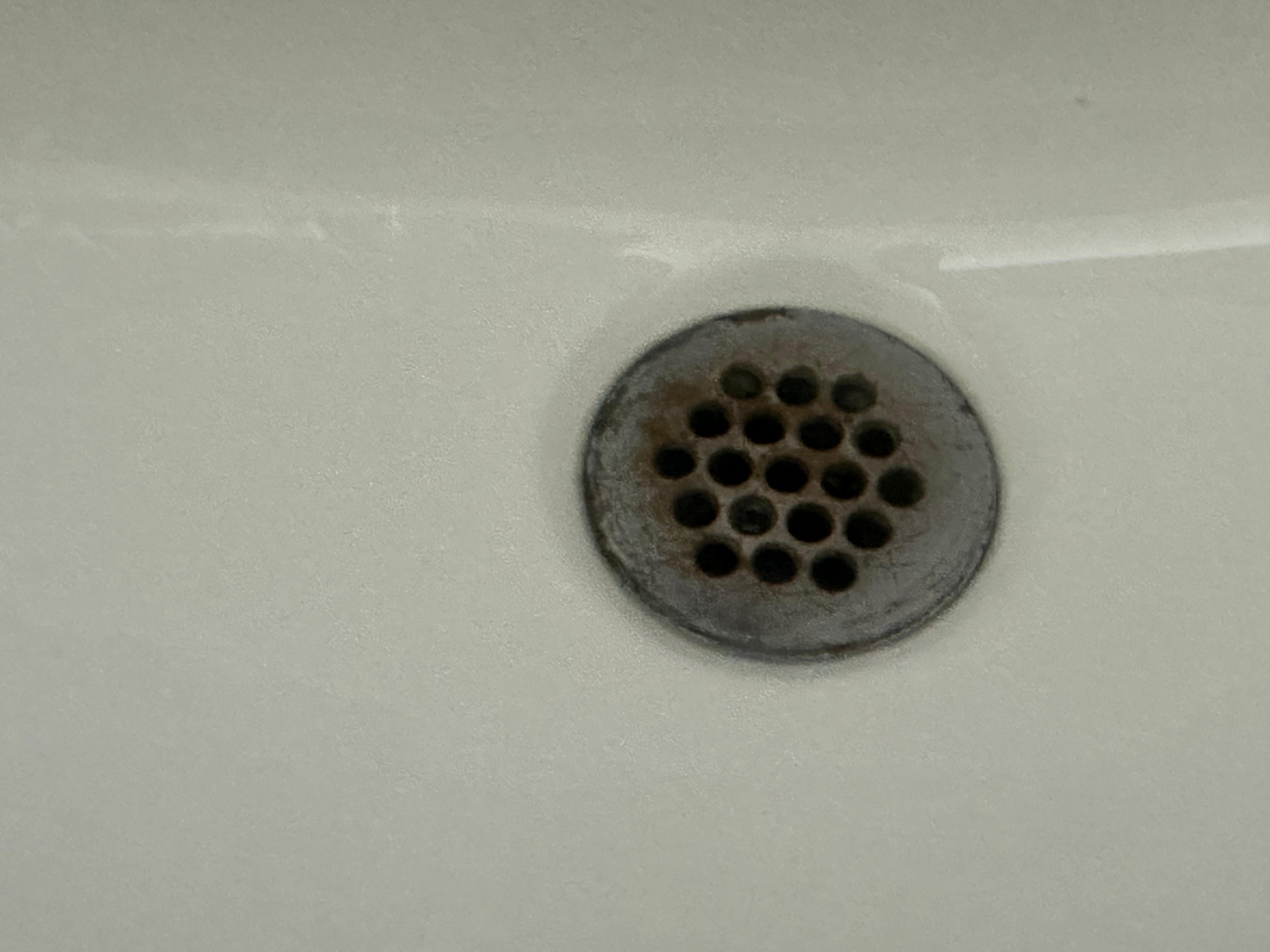 Corroded bathroom drain