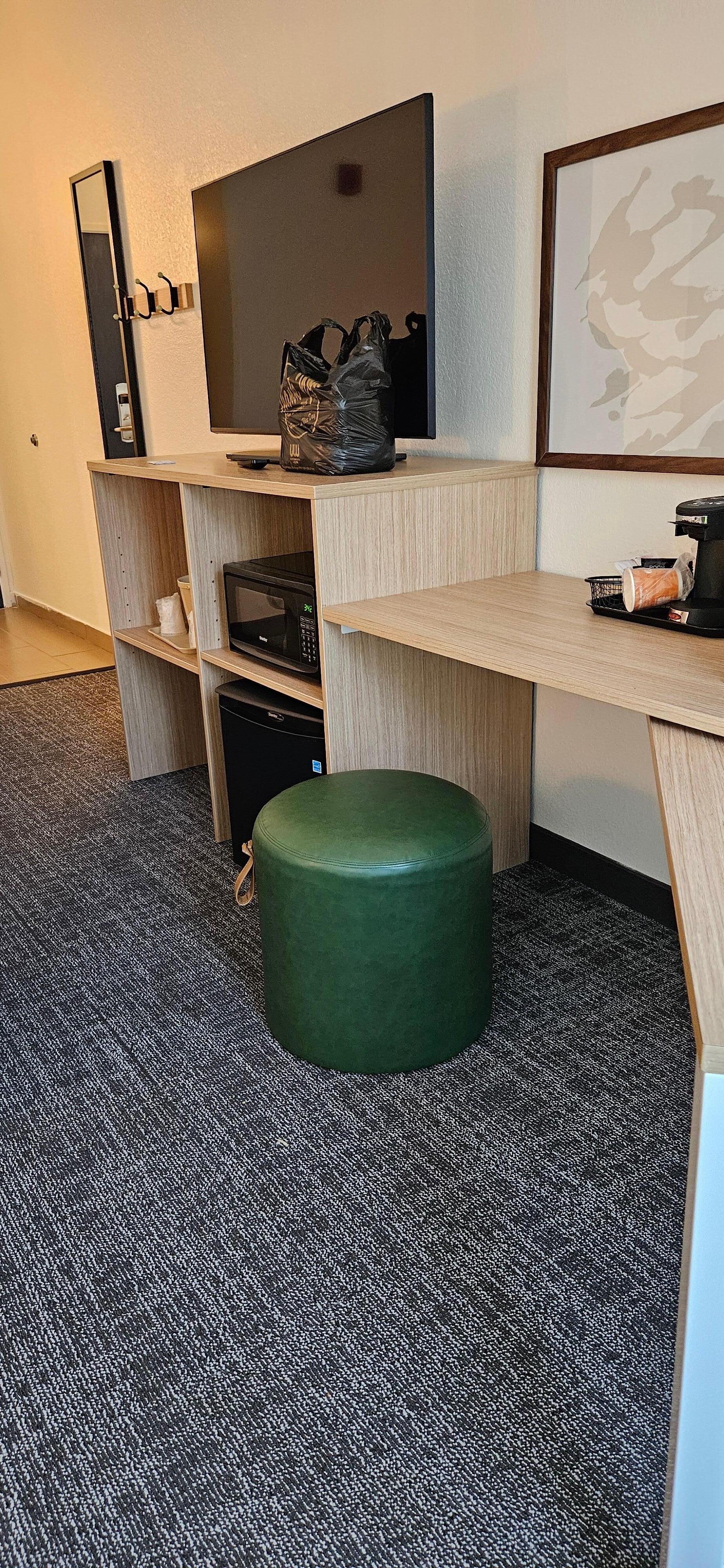 Swivel table, coffee machine, mini fridge and microwave