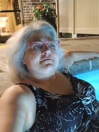 Enjoying the outdoors hot tub.