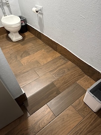 Single tile ramp in bathroom