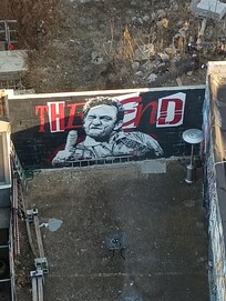 This is the view from next to our room. Seemed like surreal reminder of how they treat customers with parking.