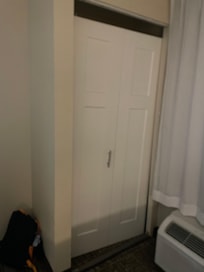 Closet door not attached, just propped there
