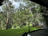 View from the carport. The cabin deck is on the right.