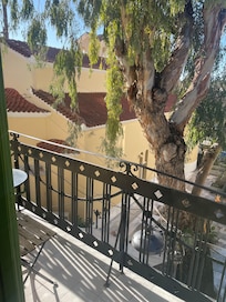The view from our balcony— a very old church next door.
