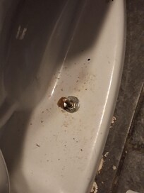 Dried urine by toilet