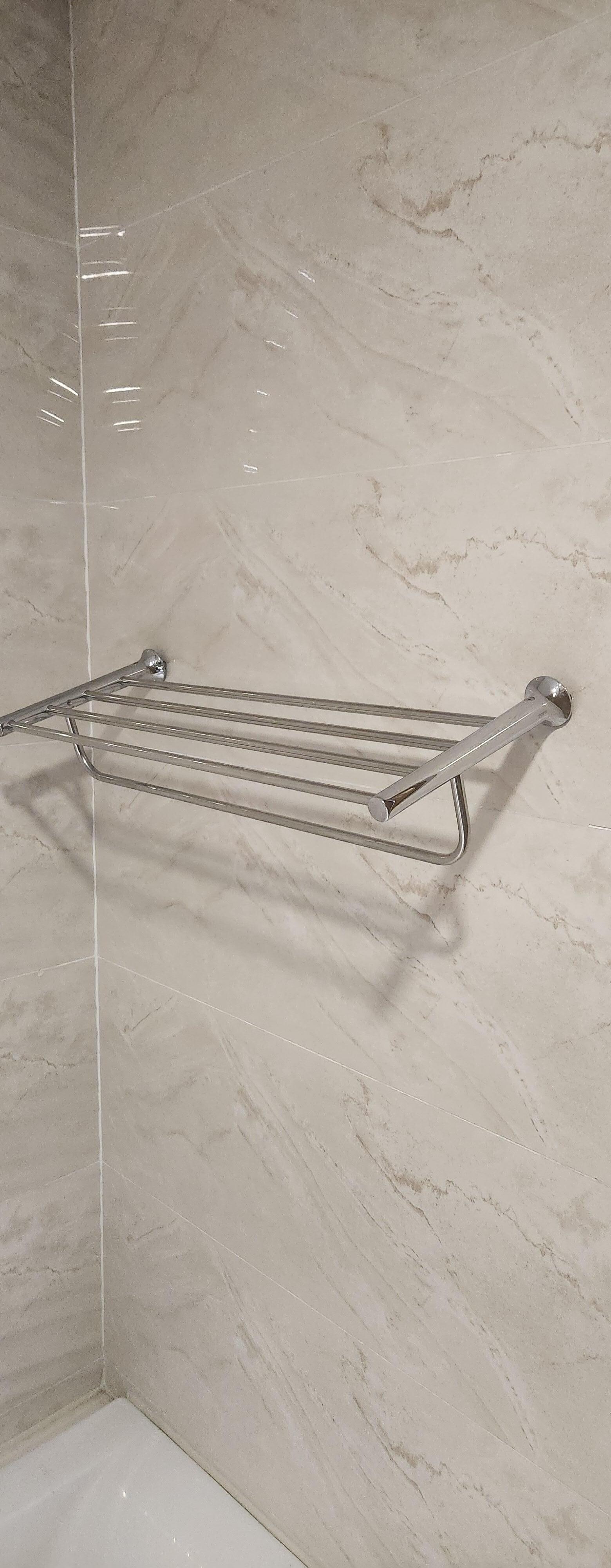  Broken tower rack over bath tub