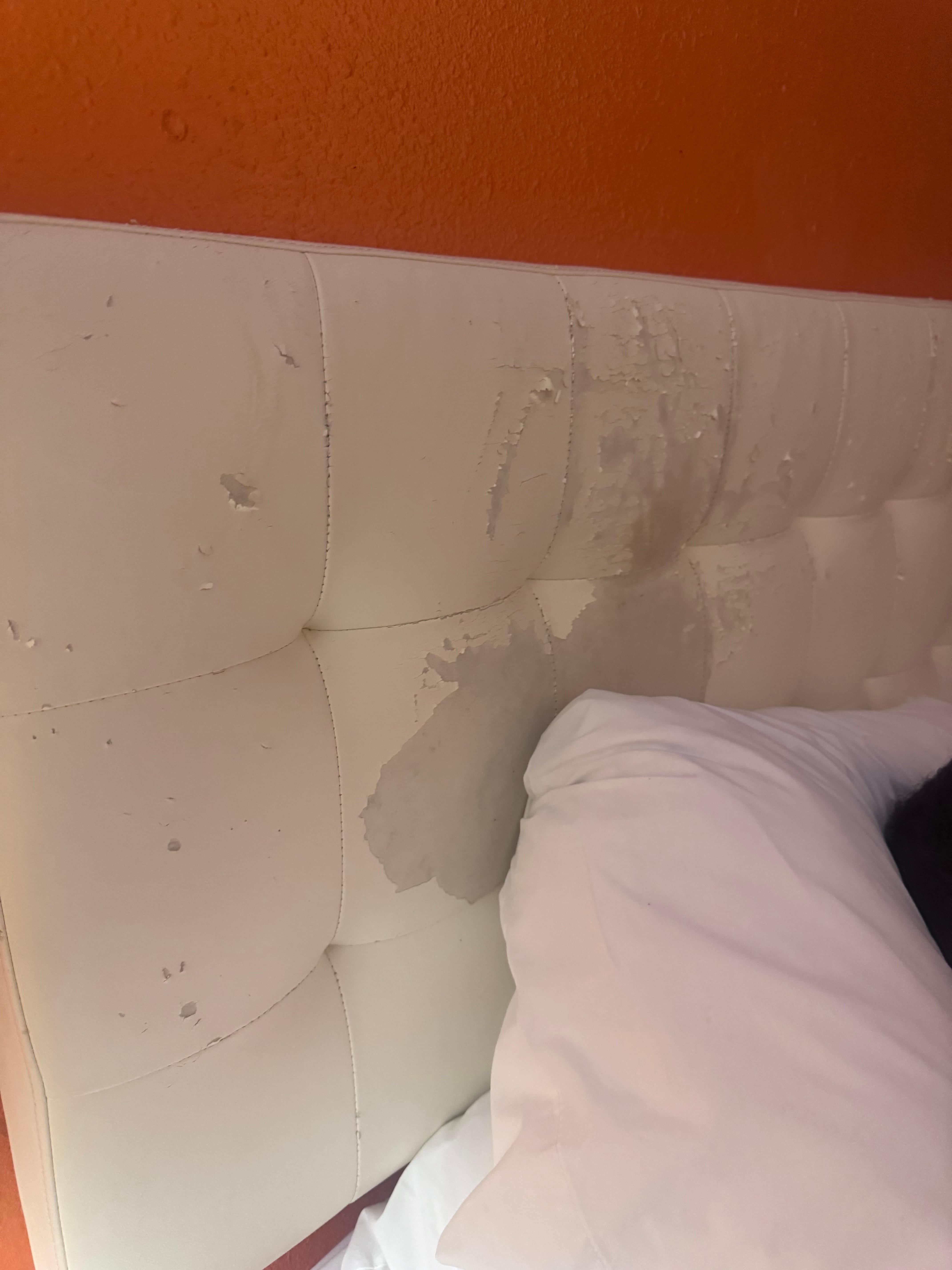 cracked and peeling headboard 