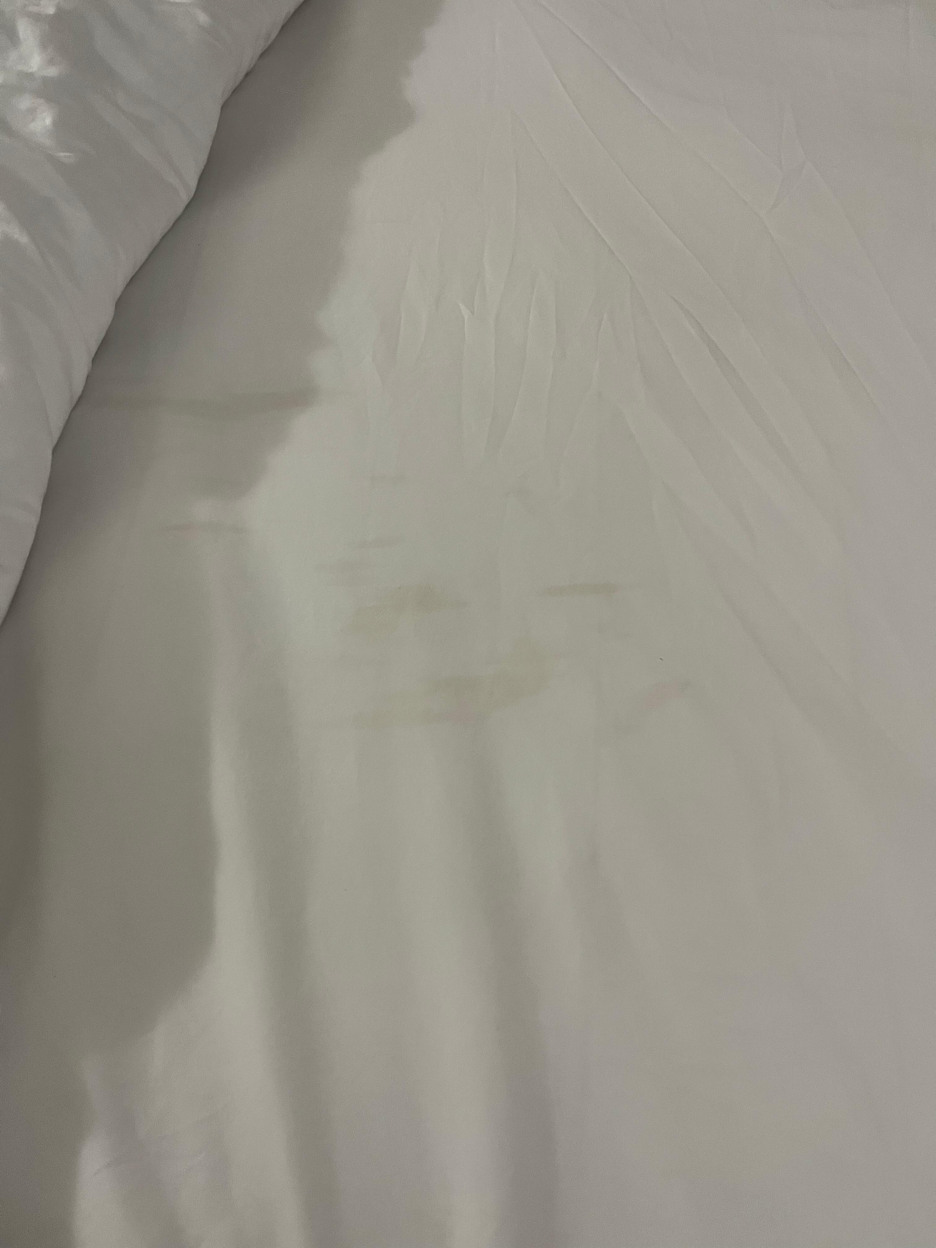 Sheets either stained or dirty