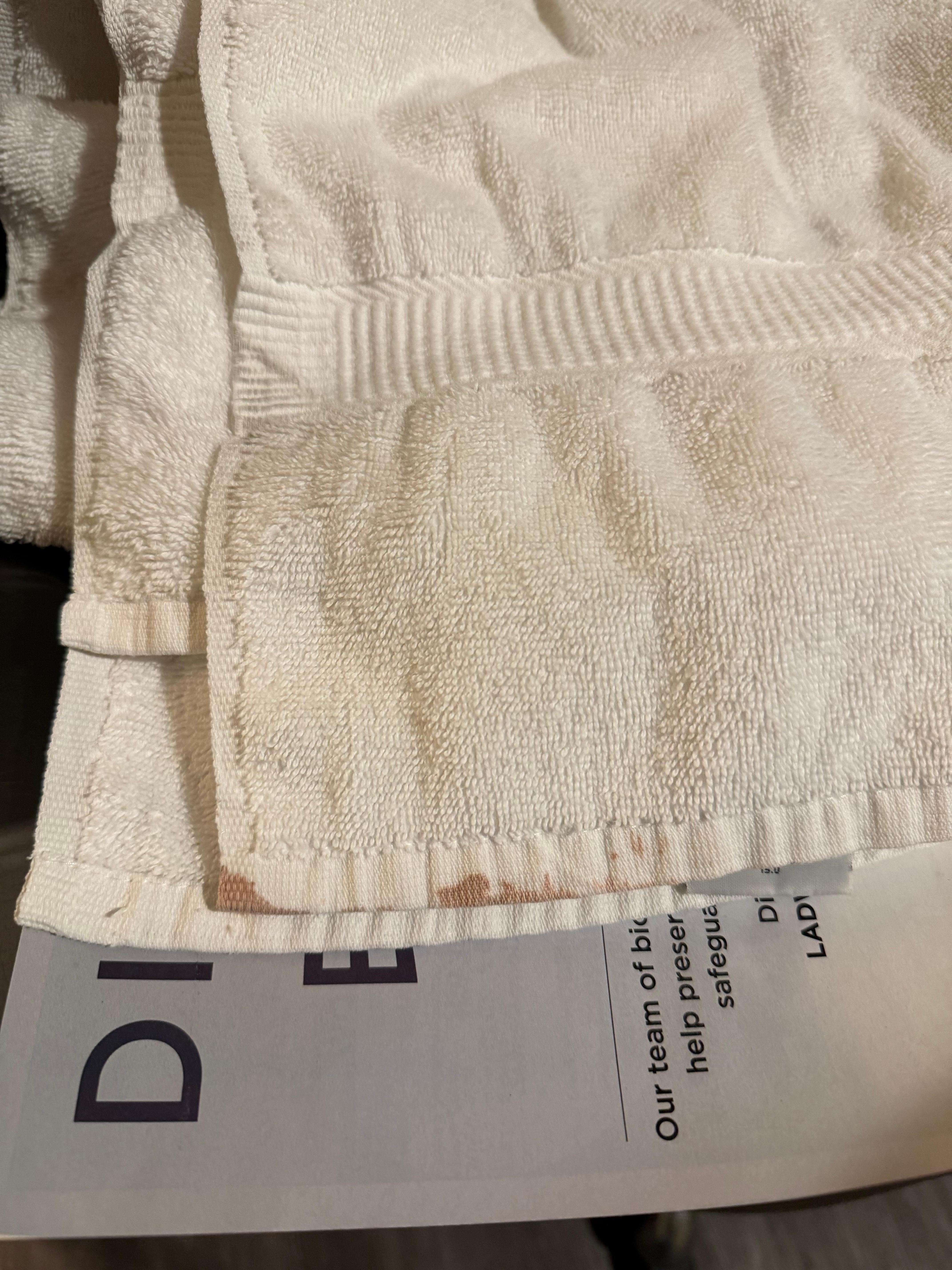 Towel with stains.