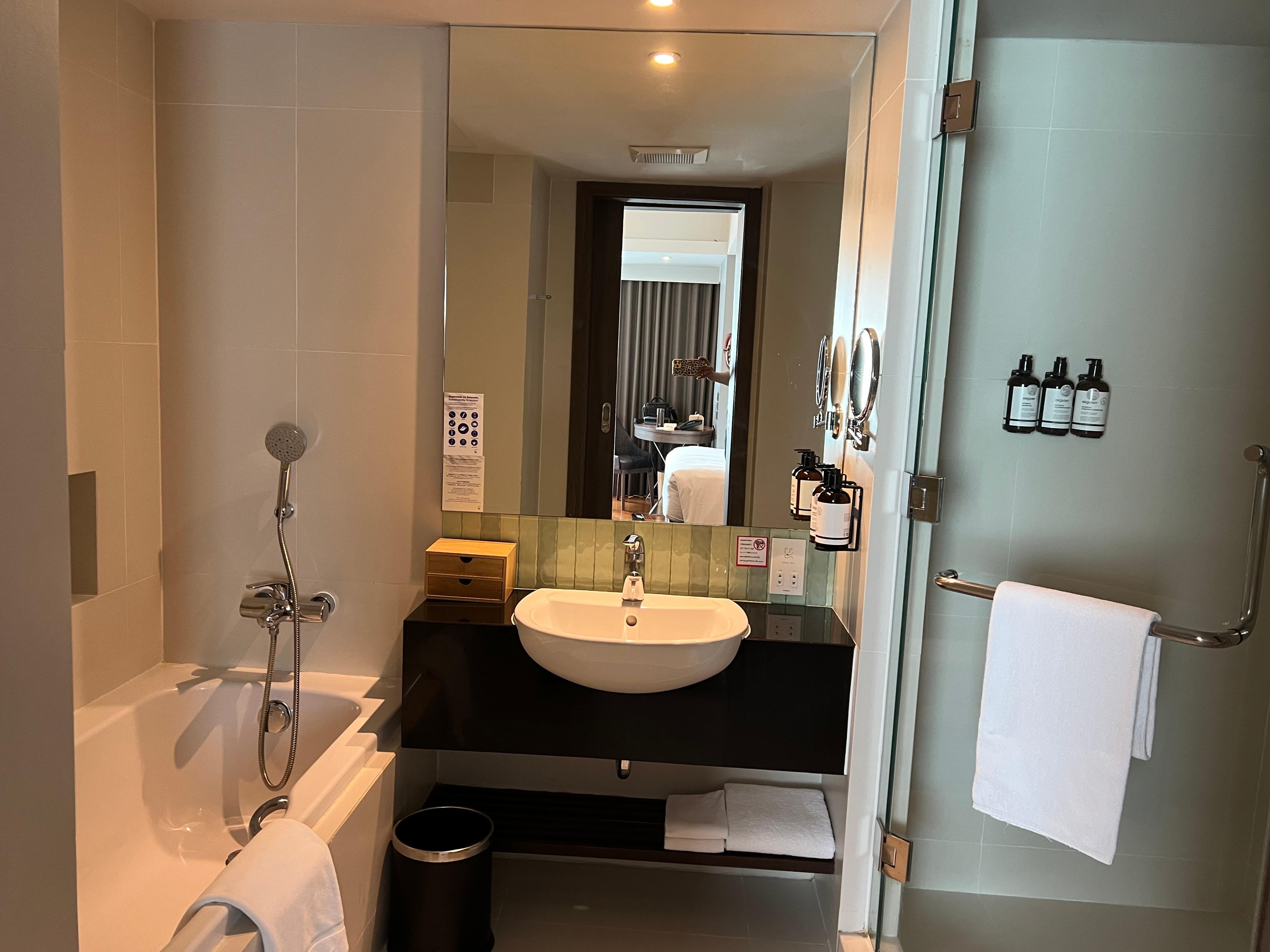 With bathtub and shower 