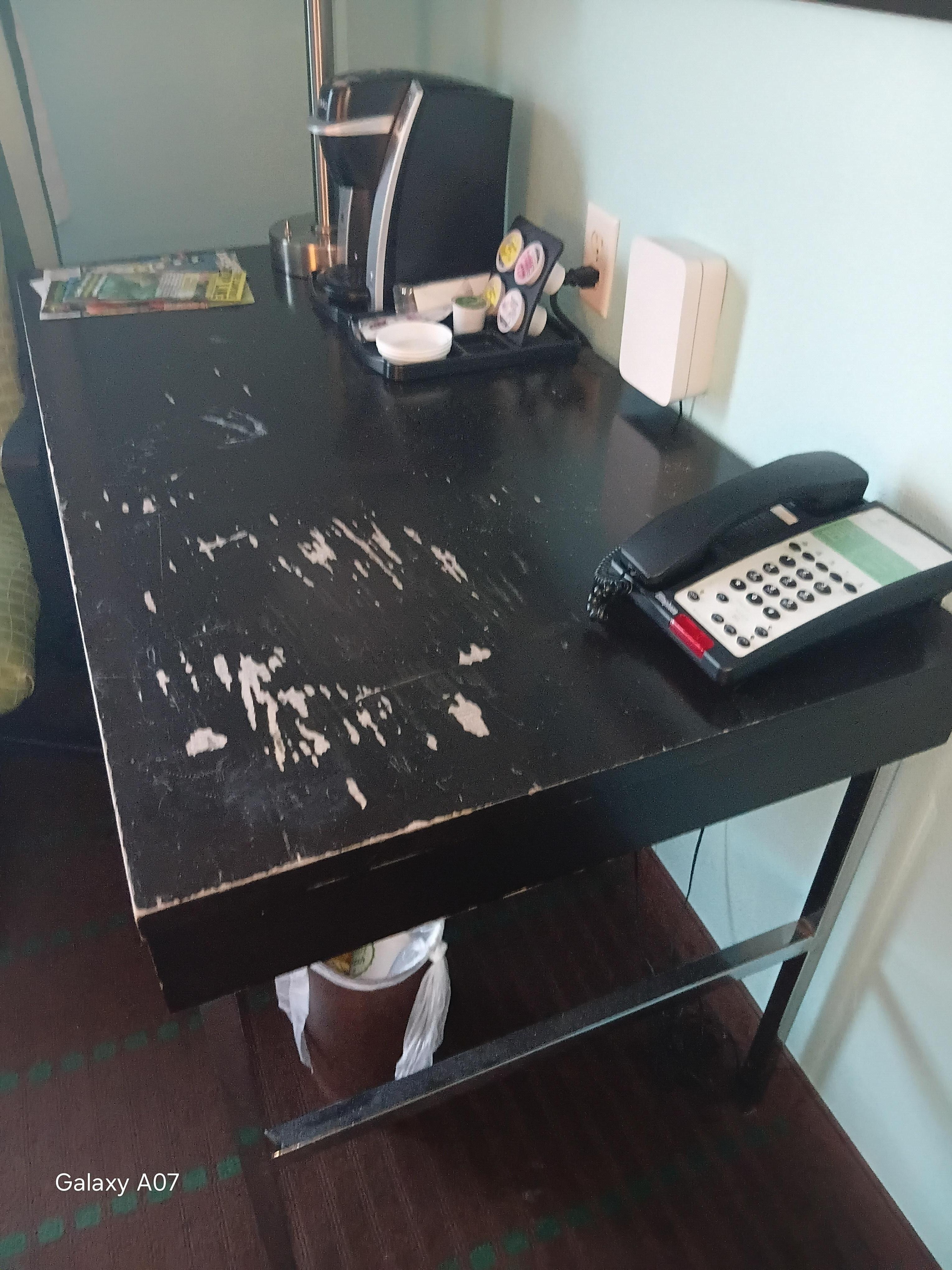 Badly scratched up desk