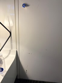 Scuffed walls and doors