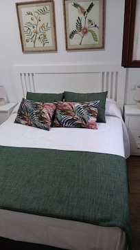 Picture of room with a single double bed.
