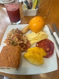 Breakfast. Fresh strawberry juice. Colombian staples.