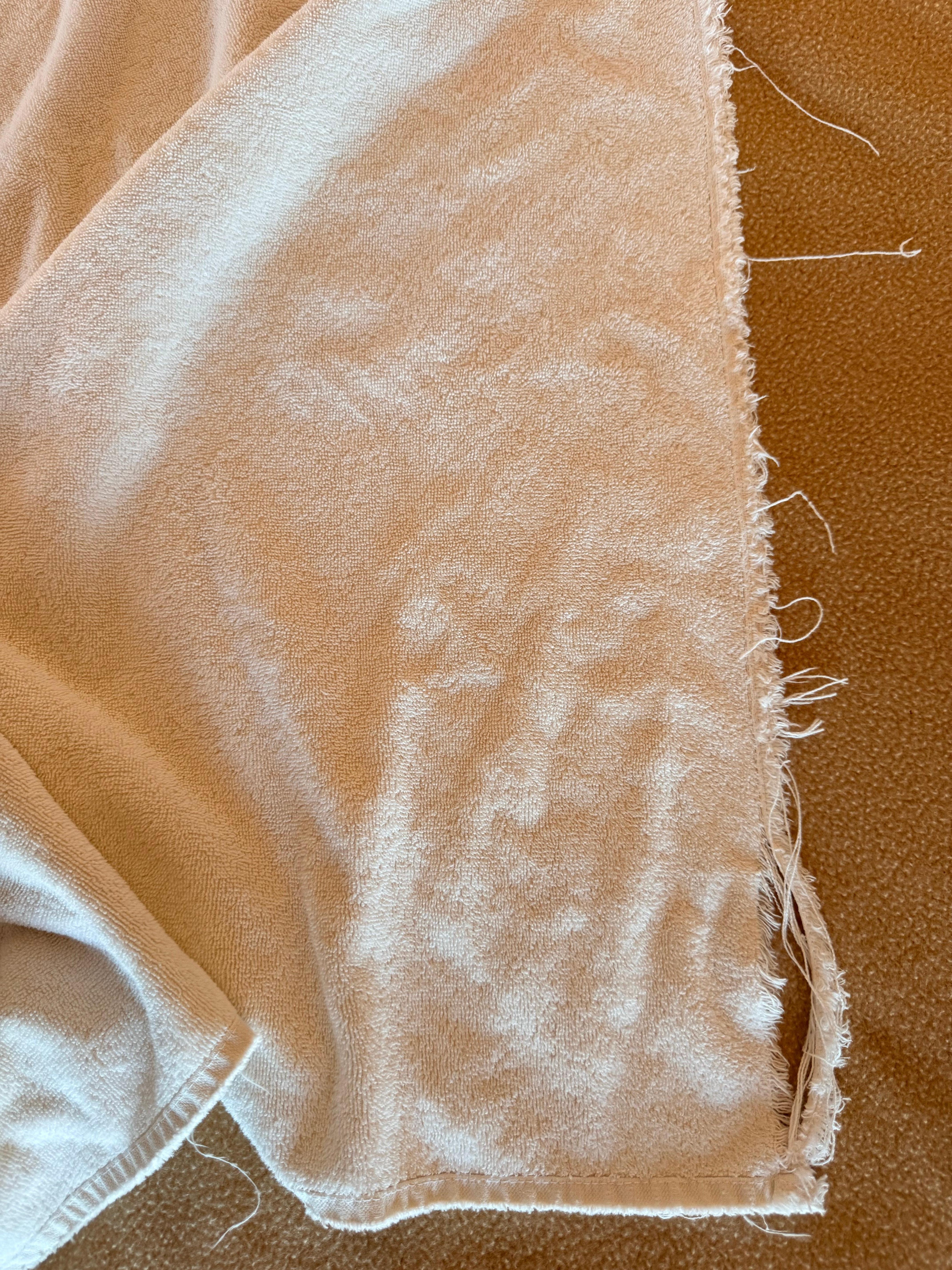 Torn hard towels with holes in them 