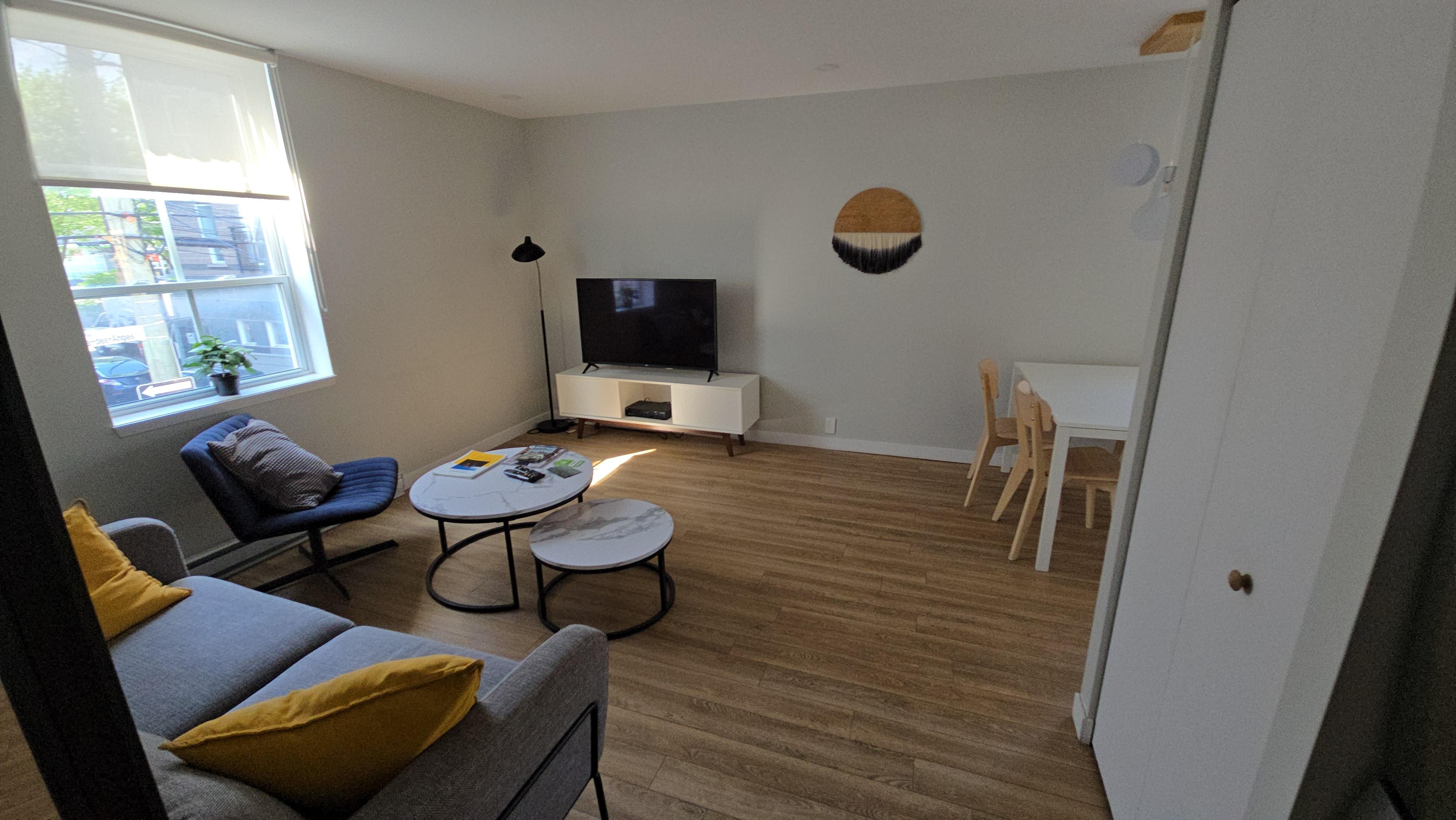 View of Living room from the door of apartment. Bedroom doors are on left and right from the entry of apartment (can't see them from this photo)