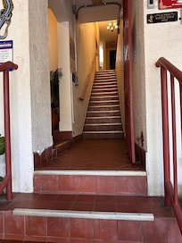 Lots of stairs. No elevator. Various levels and much larger than what it appears on the outside.