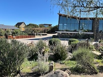 Property grounds with chapel and restaurant in the background