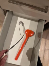 Unusable utensils. Spatula folded in half