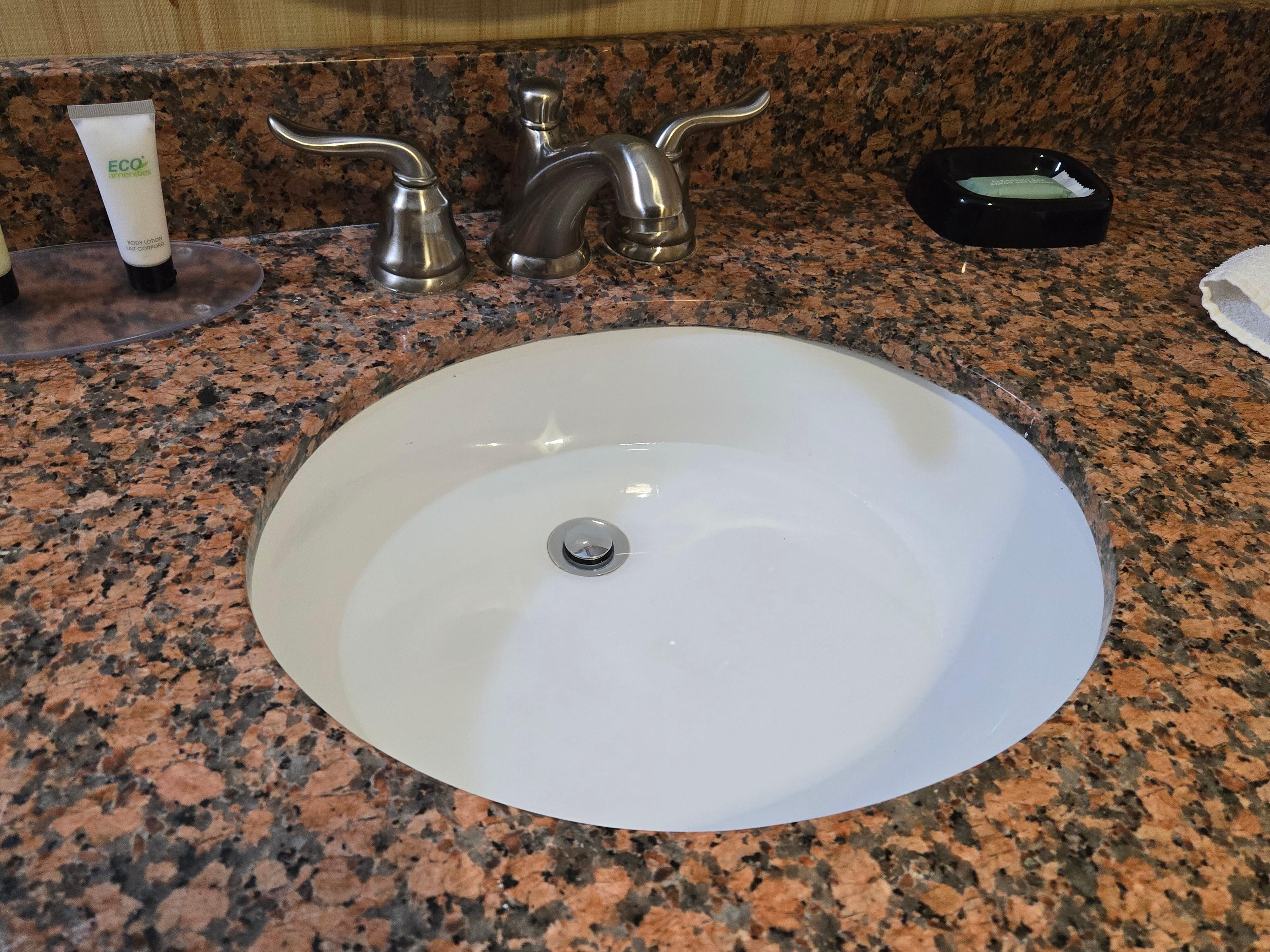 Slow draining sink