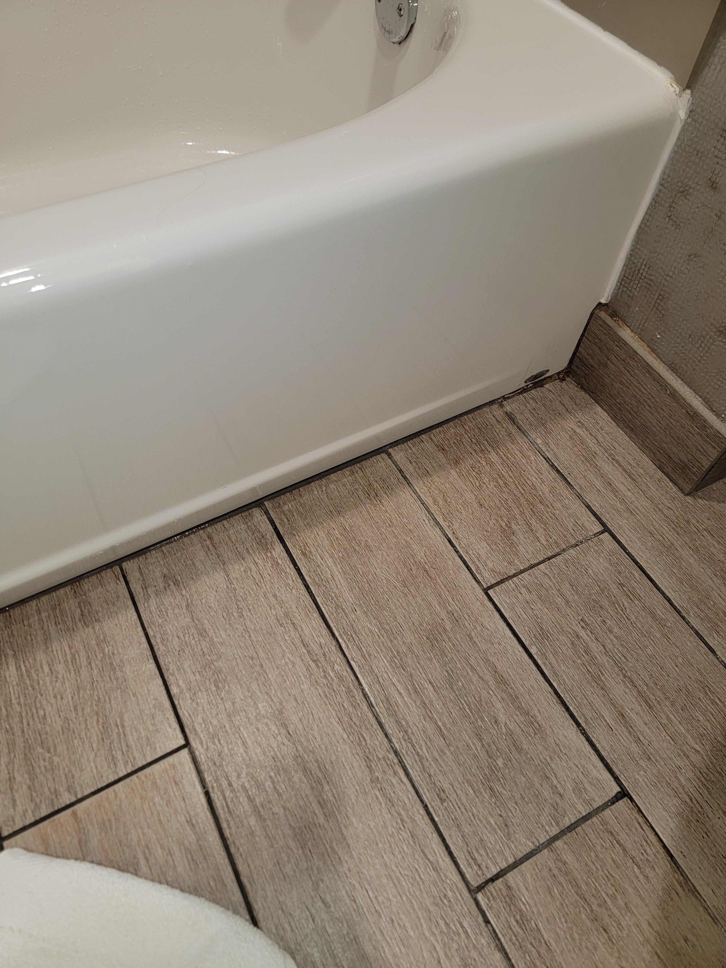 Missing grout between bathroom tiles
