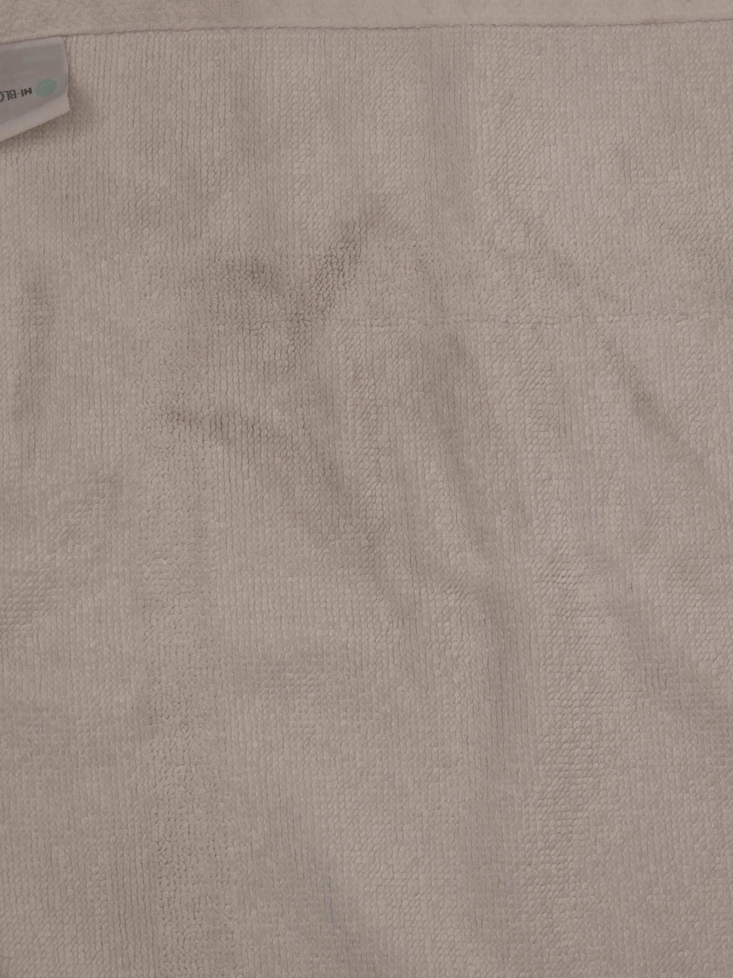 This was the towel we were left with to step out of the shower. Stained. The bed was not completely made and the room had a bad odor. I had to ask for an air freshener.