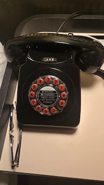 My favorite part of the room. So cool seeing a rotary phone in this age of technology.