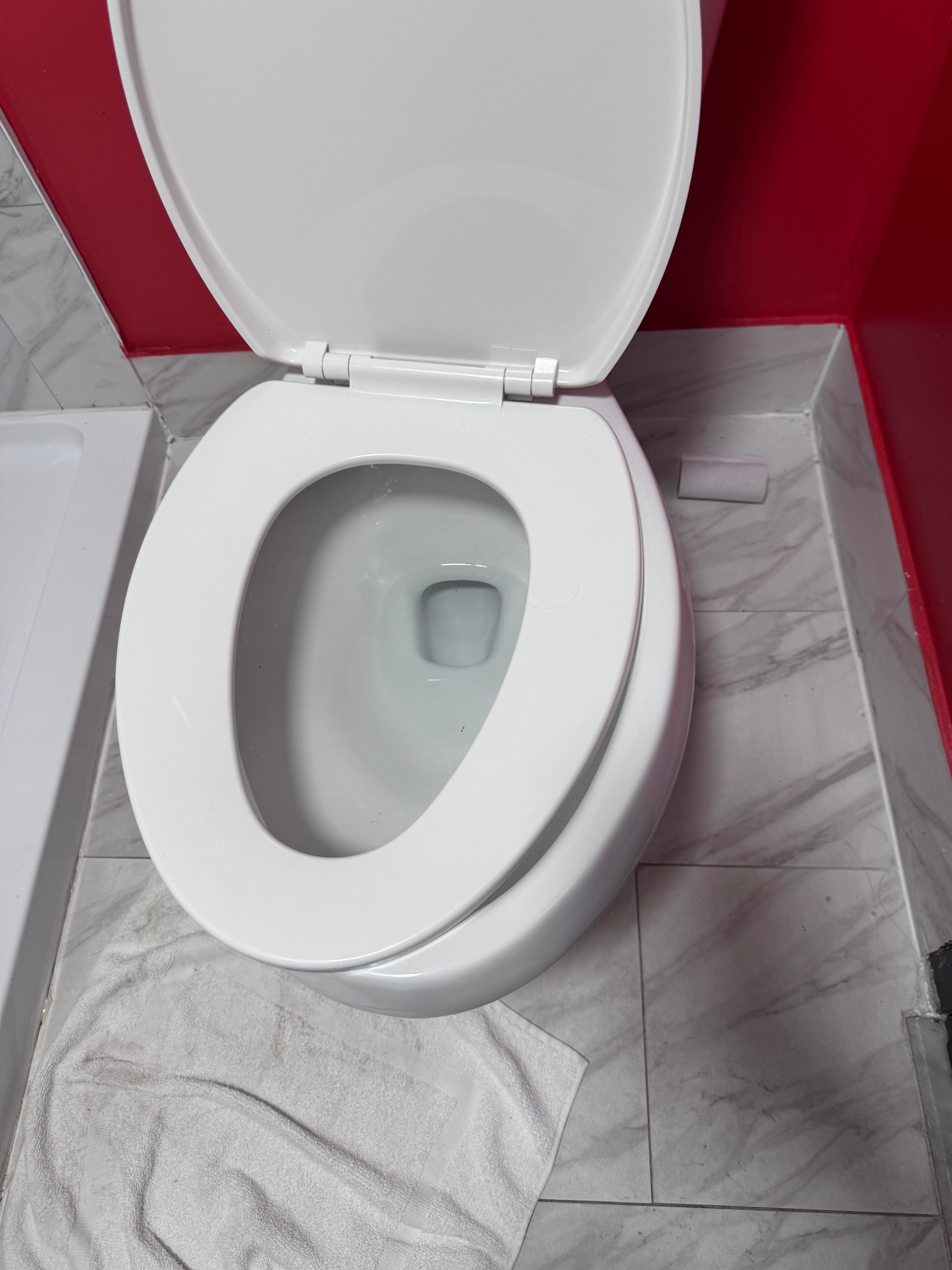 Toilet seat had one bolt holding the seat down