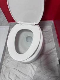 Toilet seat had one bolt holding the seat down