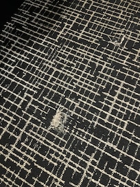 Tear in the floor and no light bulbs in the bedside lamps