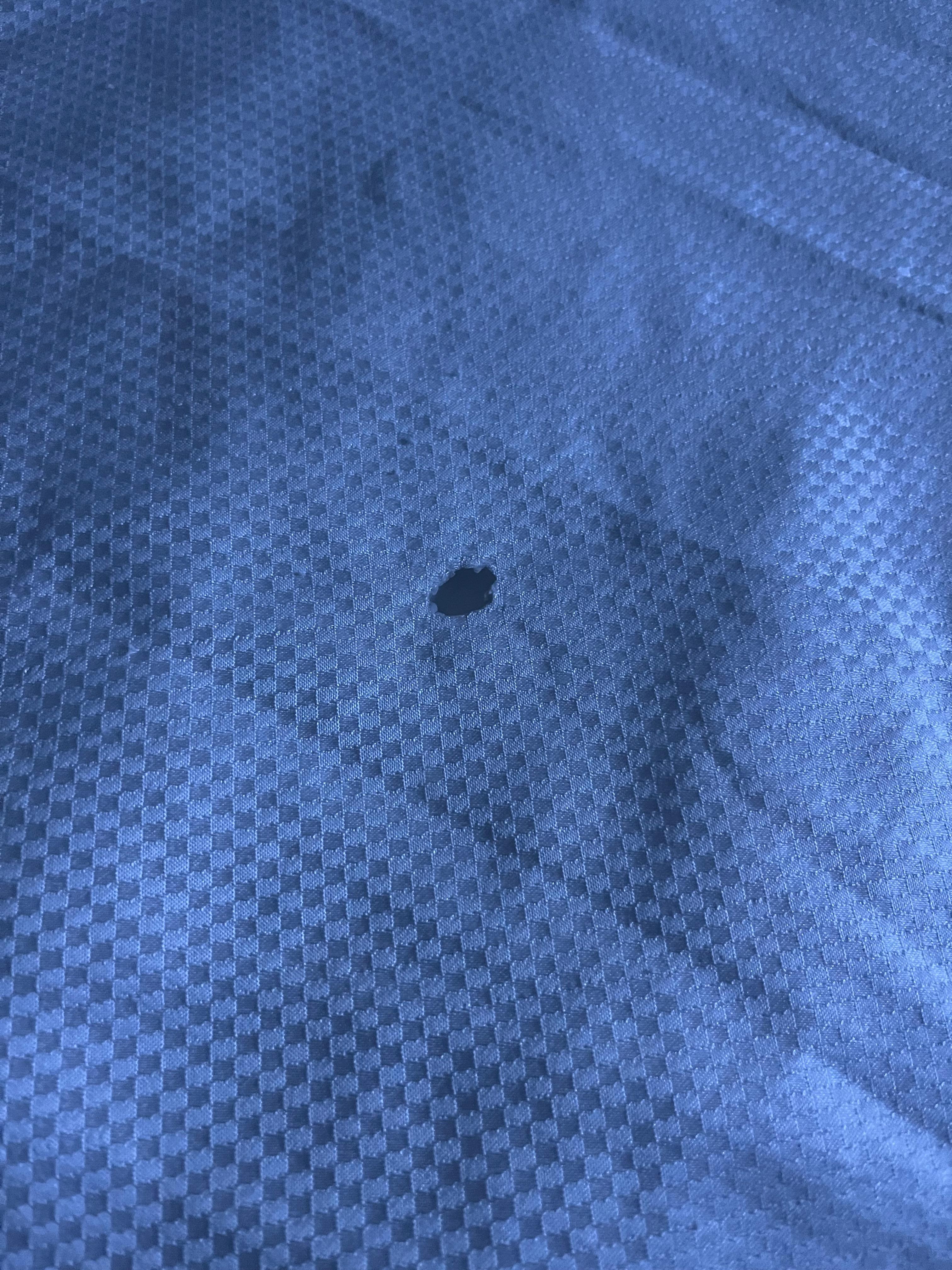 A hole on the comforter.